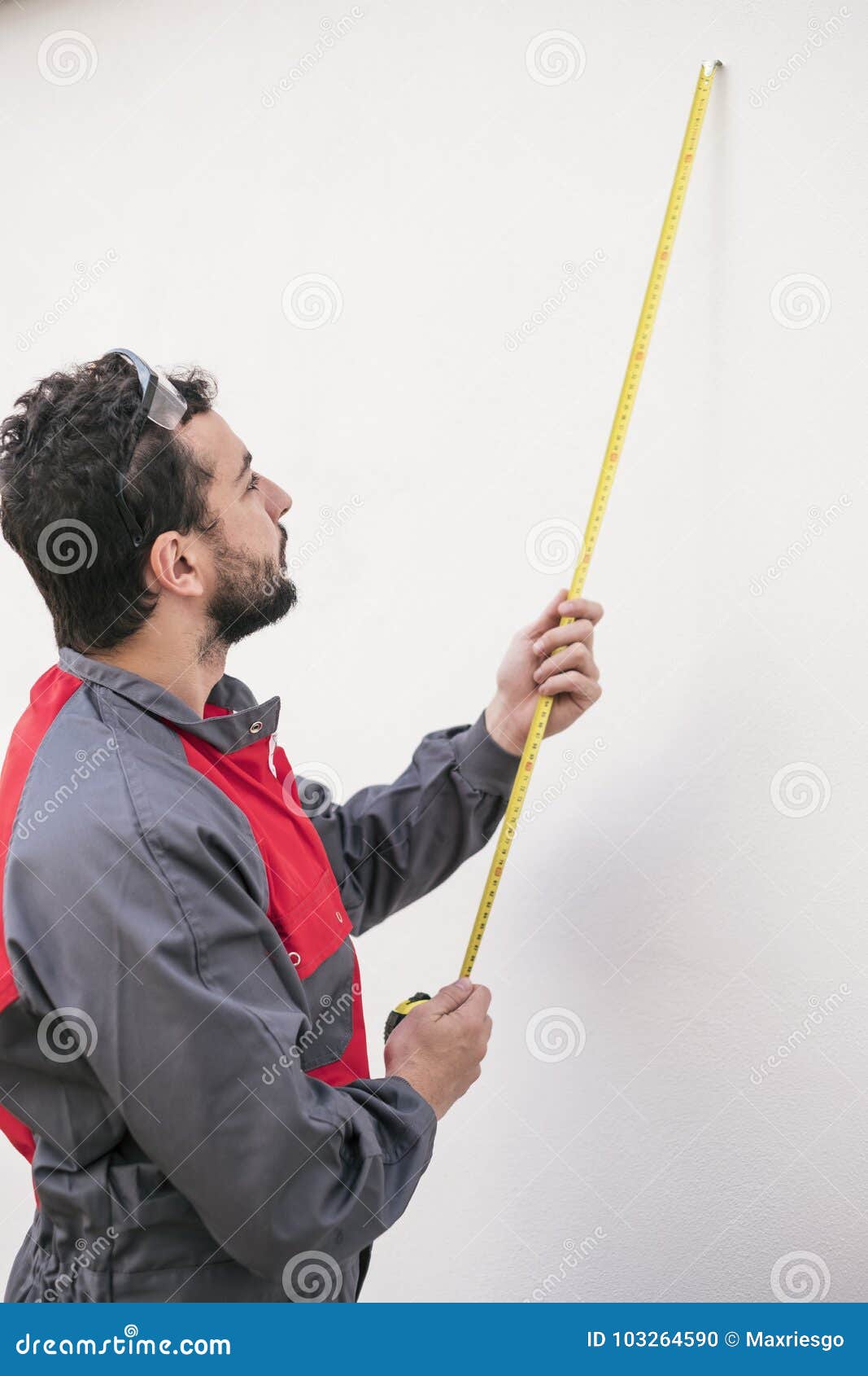 The worker guy measuring stock photo. Image of bearded - 103264590