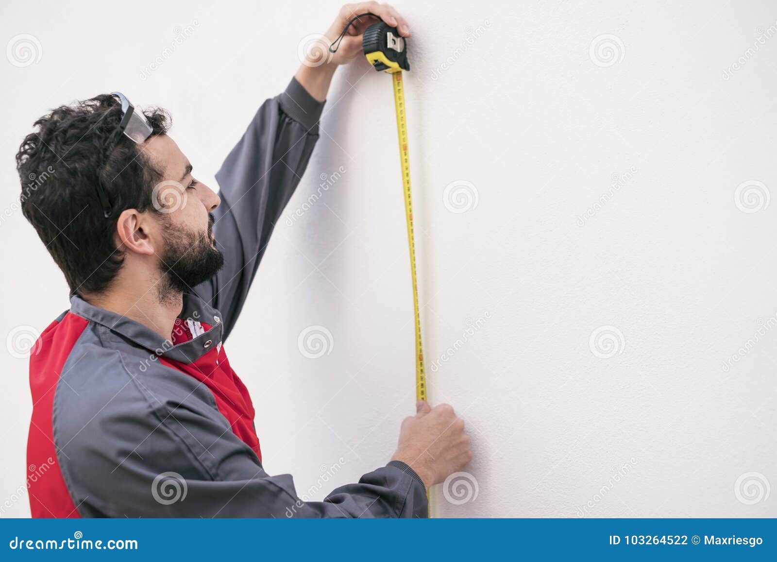 The worker guy measuring stock photo. Image of posing - 103264522