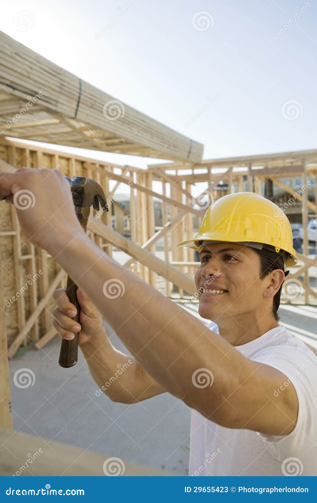 Worker Hammering at Construction Site Stock Image - Image of middle ...