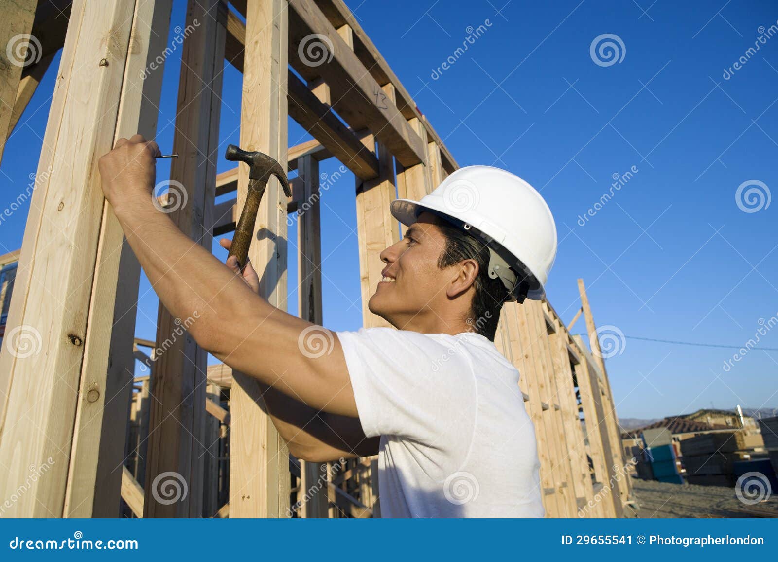 Worker Hammering Nail on Wooden Wall Stock Image - Image of ethnicity ...