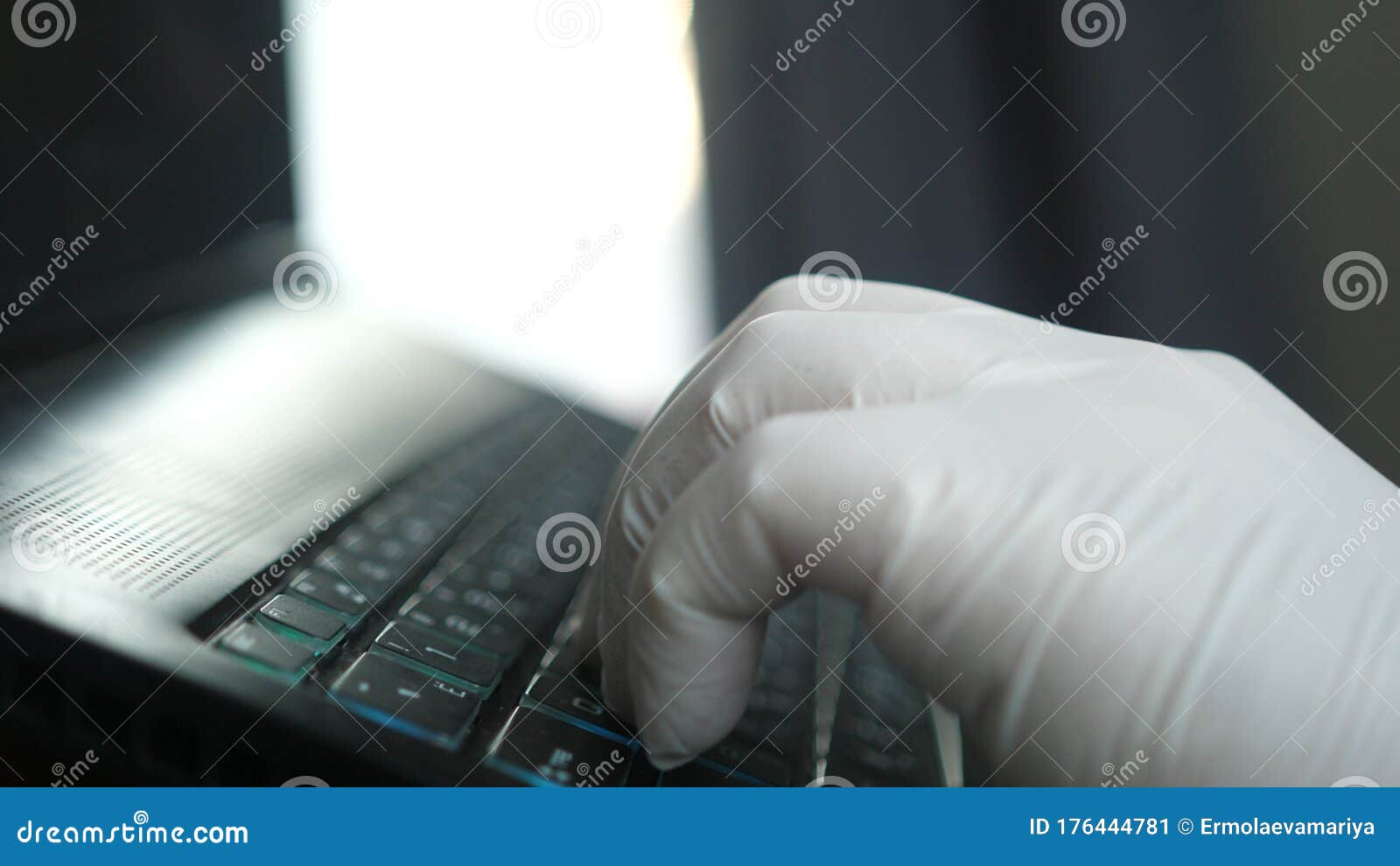 Worker Hand with Glove Working with a Computer Typing on a Laptop Stock ...