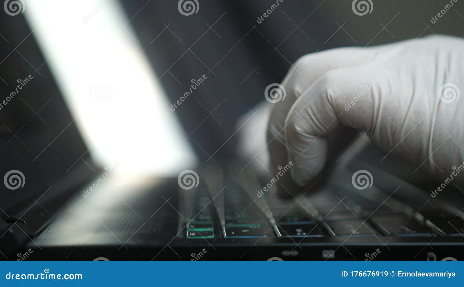 Worker Hand with Glove Working with a Computer Typing on a Laptop Stock ...