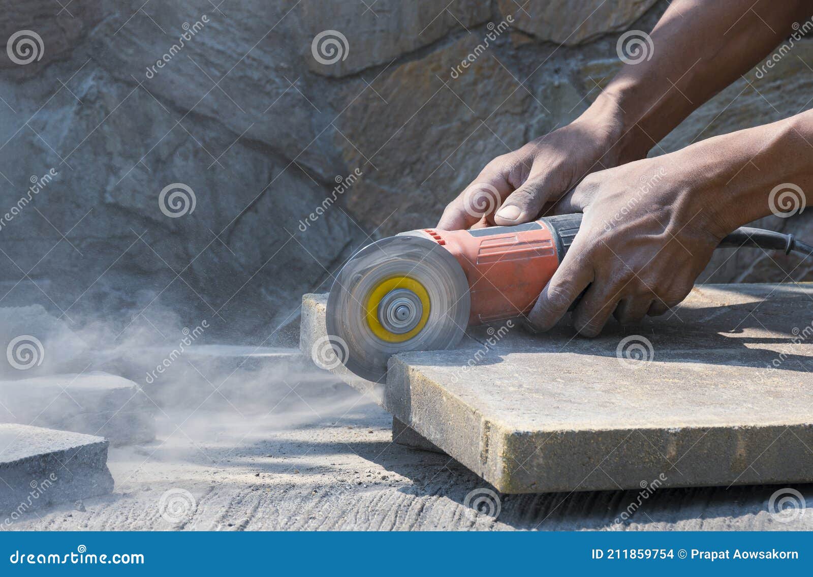 Worker Hand Using Grinder Cutting Stone Tile Floor for Paving Pavement ...