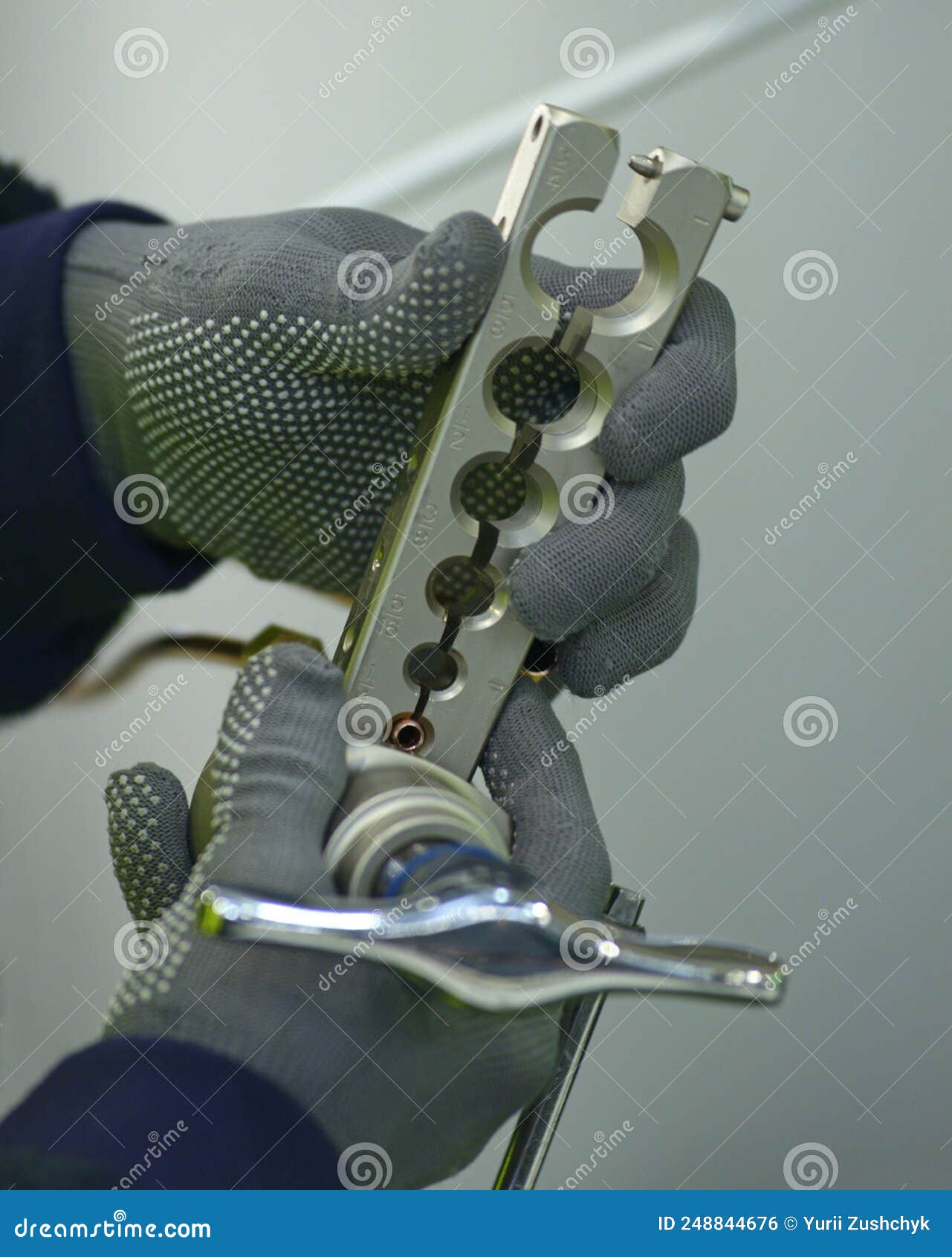Worker Hands Fitting Clamps for Cables of an Air Conditioner Stock ...