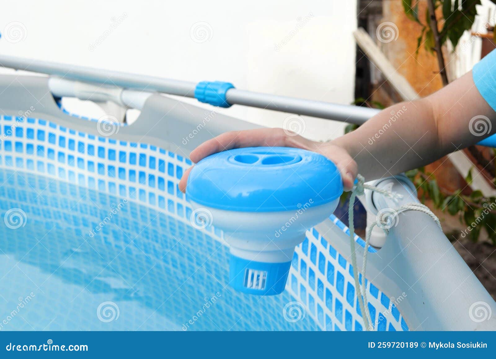 Worker Hands Isinfection and Chlorination of Water in the Pool ...