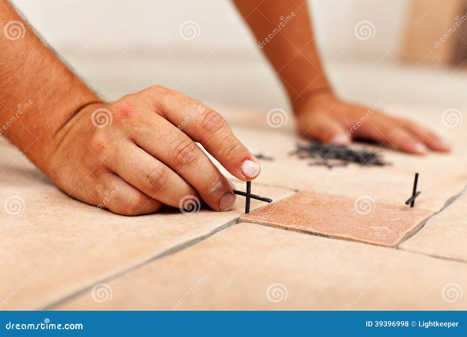 Worker Hands Placing Spacers Between Ceramic Floor Tiles Stock ...