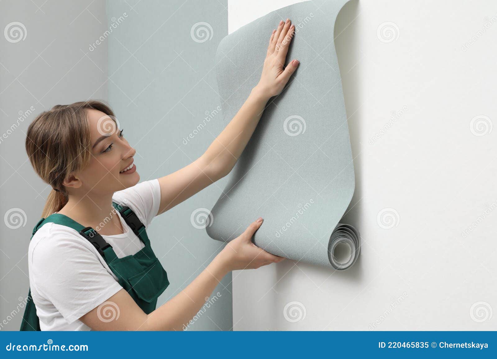 Worker Hanging Stylish Wall Paper Sheet Indoors Stock Image - Image of ...