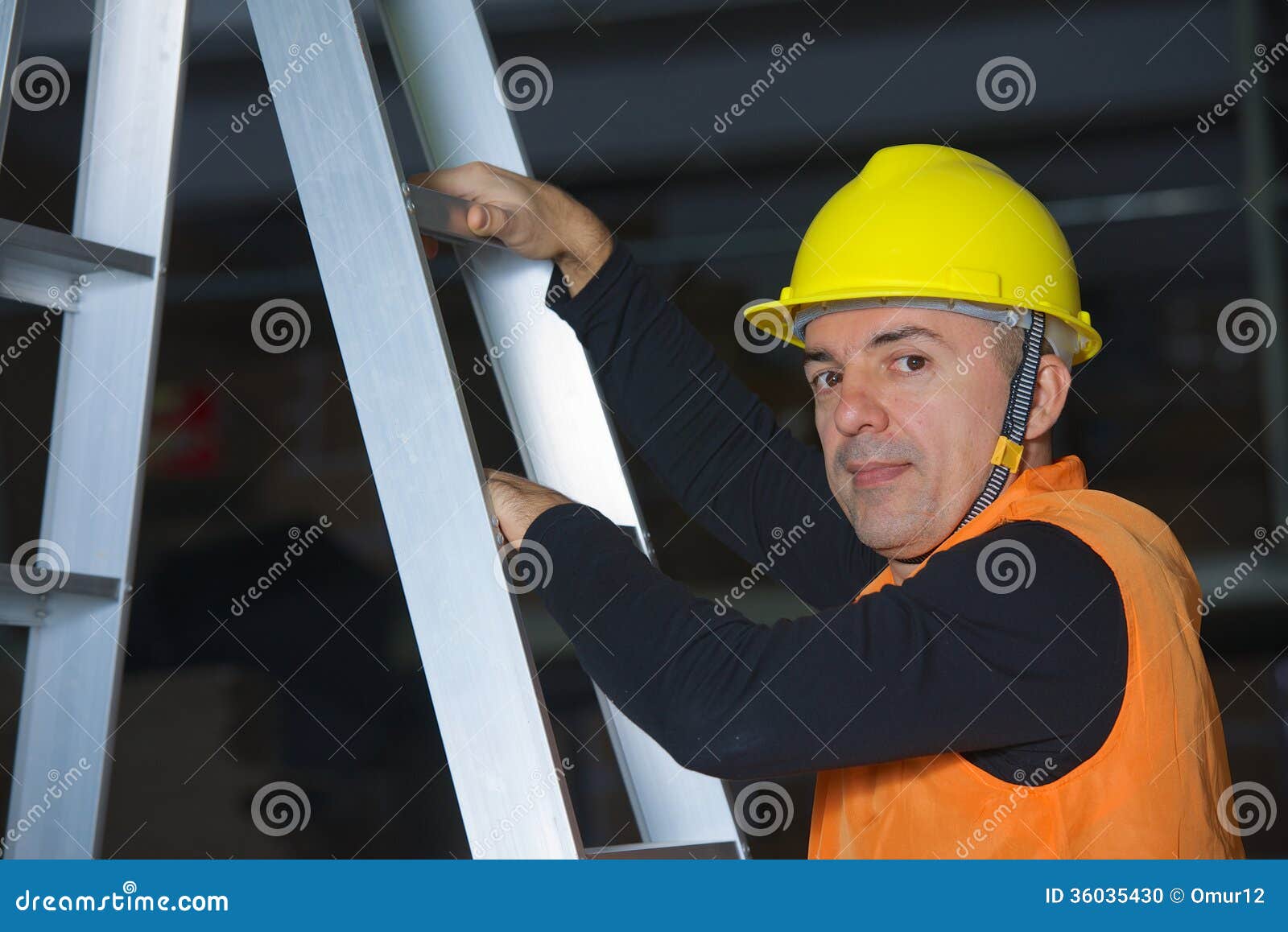 Worker in Helmet Rests on the Ladder Stock Photo - Image of helmet ...