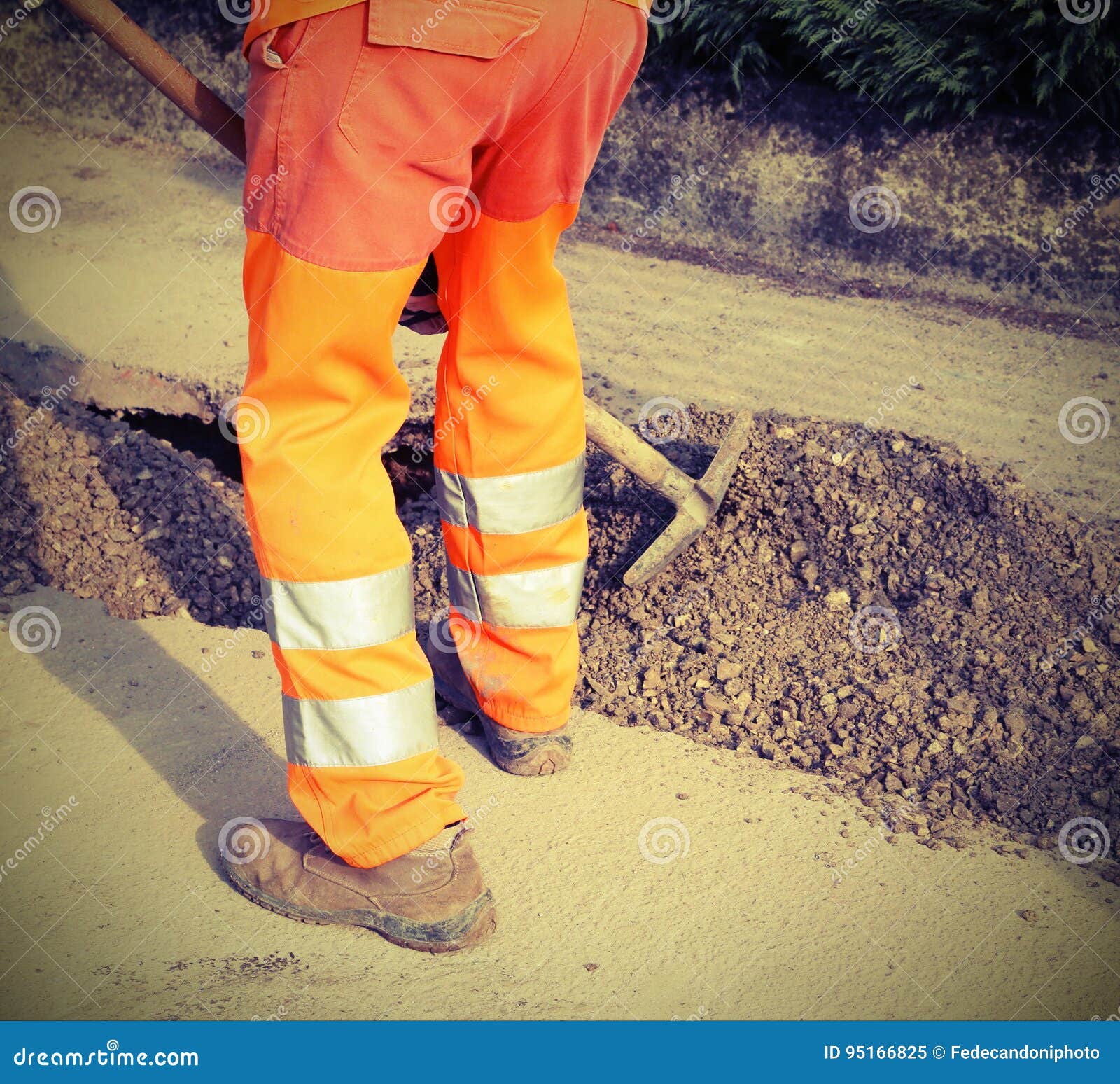 Worker with High Visibility Clothing while Working on a Road Con Stock ...