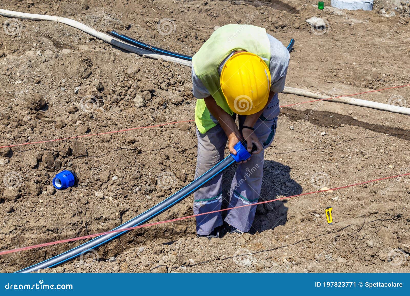 Worker Hold a Water Pipe in a Trench Stock Image - Image of piping ...