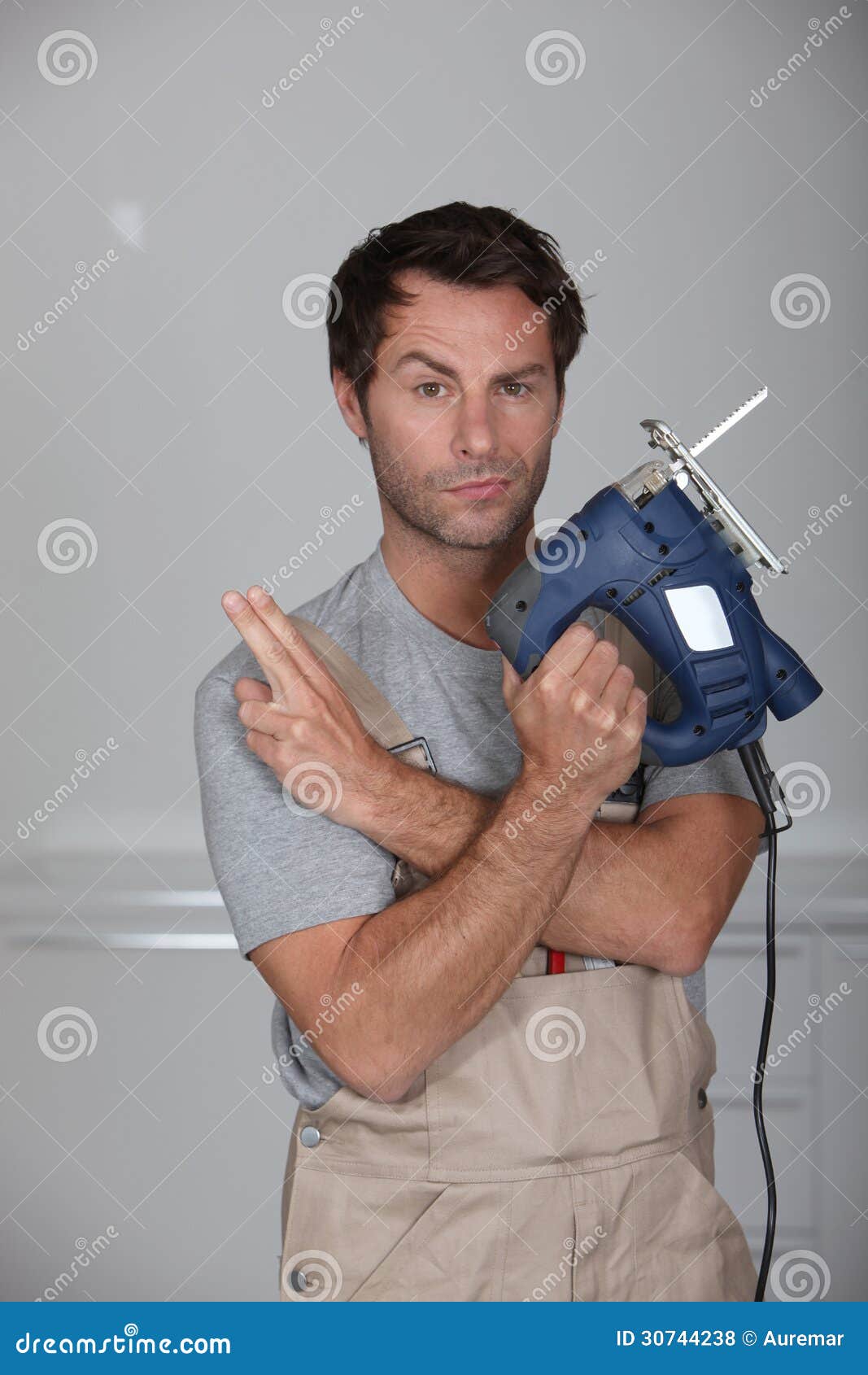 Worker holding band saw stock photo. Image of carries - 30744238