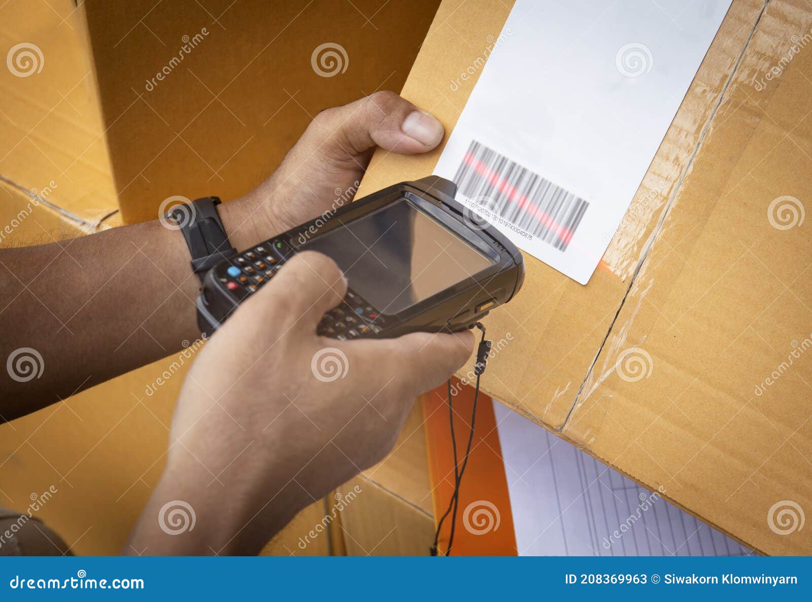 Worker Holding Barcode Scanner Scanning Red Laser on Parcel Box ...