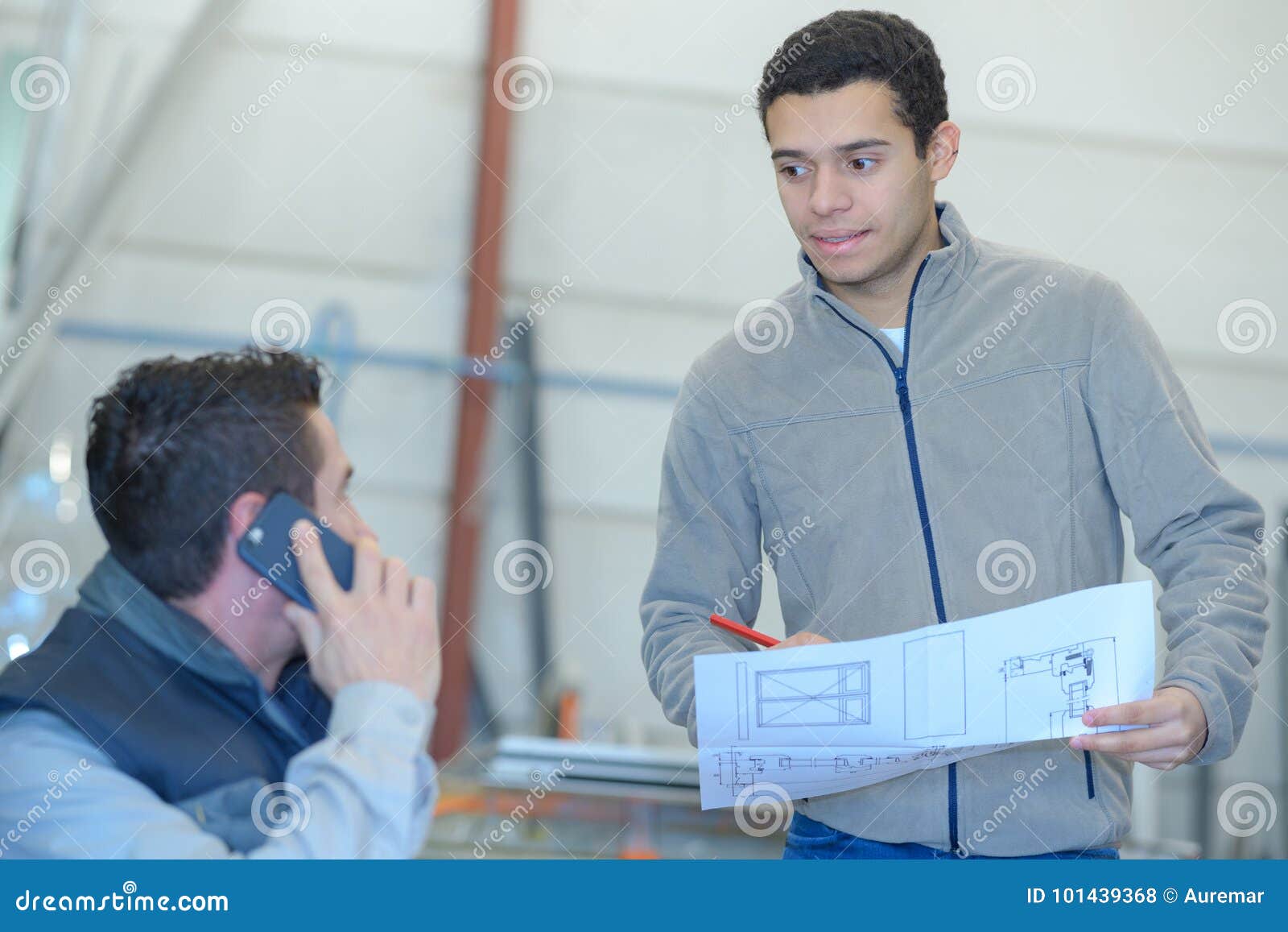 Worker Holding Design Blueprint Stock Photo - Image of colleague ...