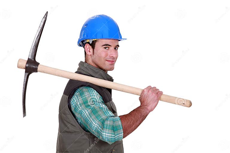 Worker holding a pickaxe. stock image. Image of tool - 35203507