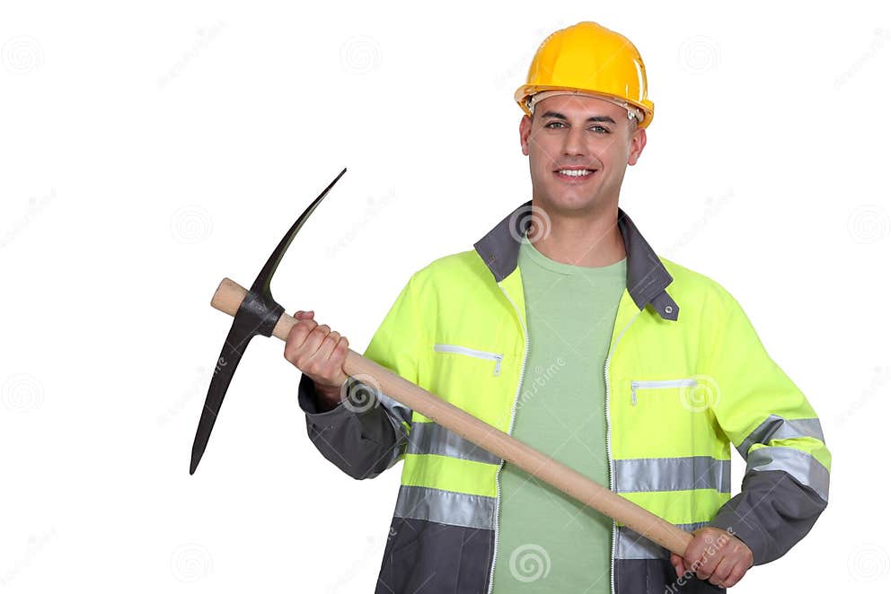 Worker holding pickaxe stock image. Image of helmet, industry - 35522765