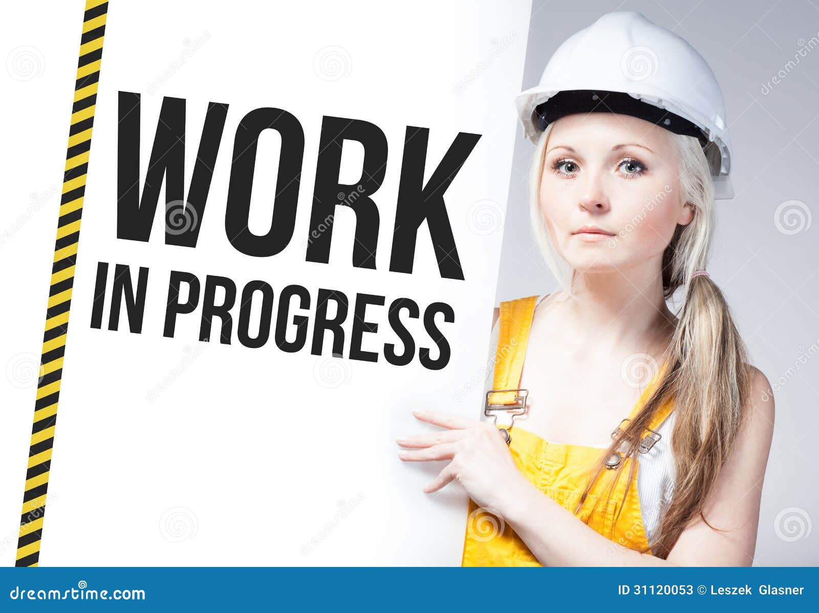 Worker Holding Work in Progress Sign on Information Board Stock Image ...