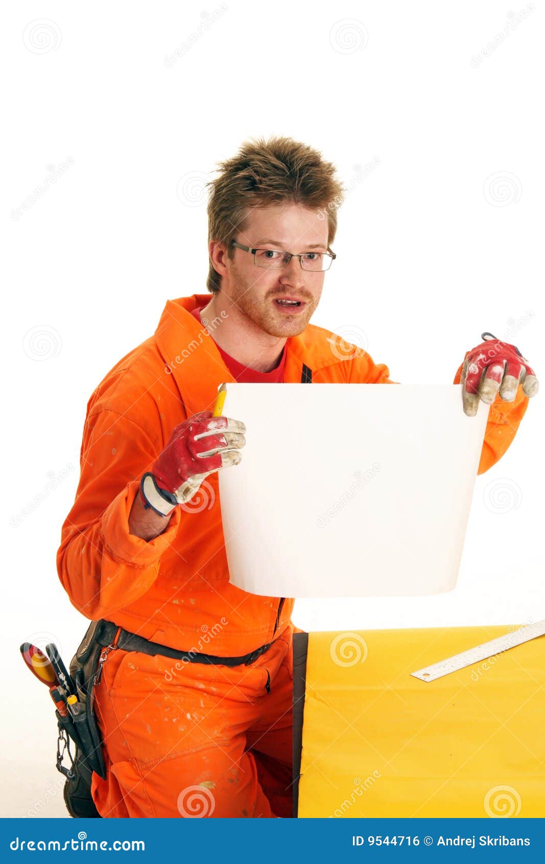Worker Holds the Sheet of White Paper Stock Photo - Image of building ...