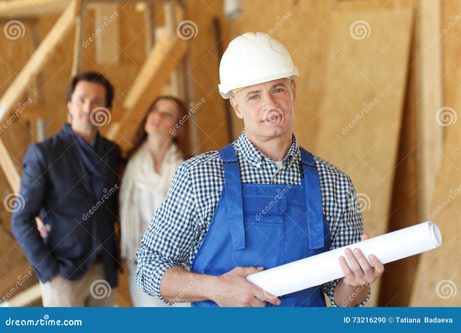 Worker and House Design Plans Stock Photo - Image of couple ...