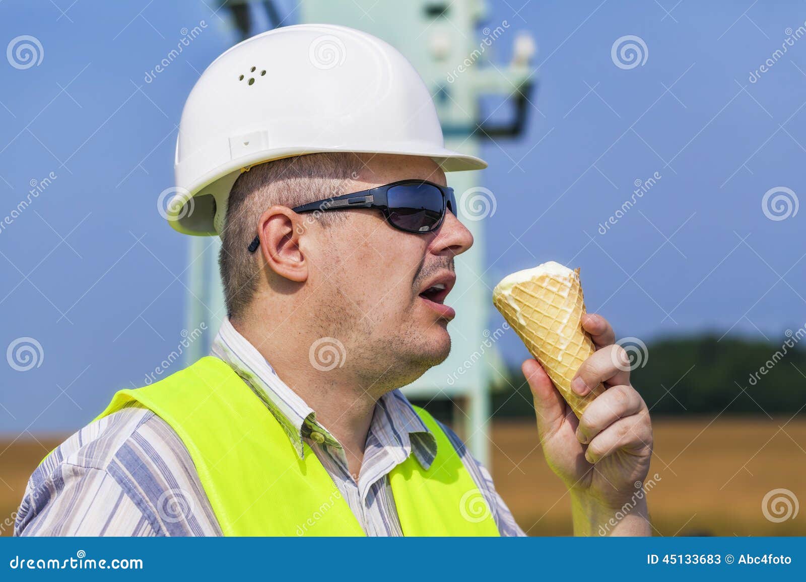 Worker with Ice Cream on a Blue Sky Background Stock Image - Image of ...