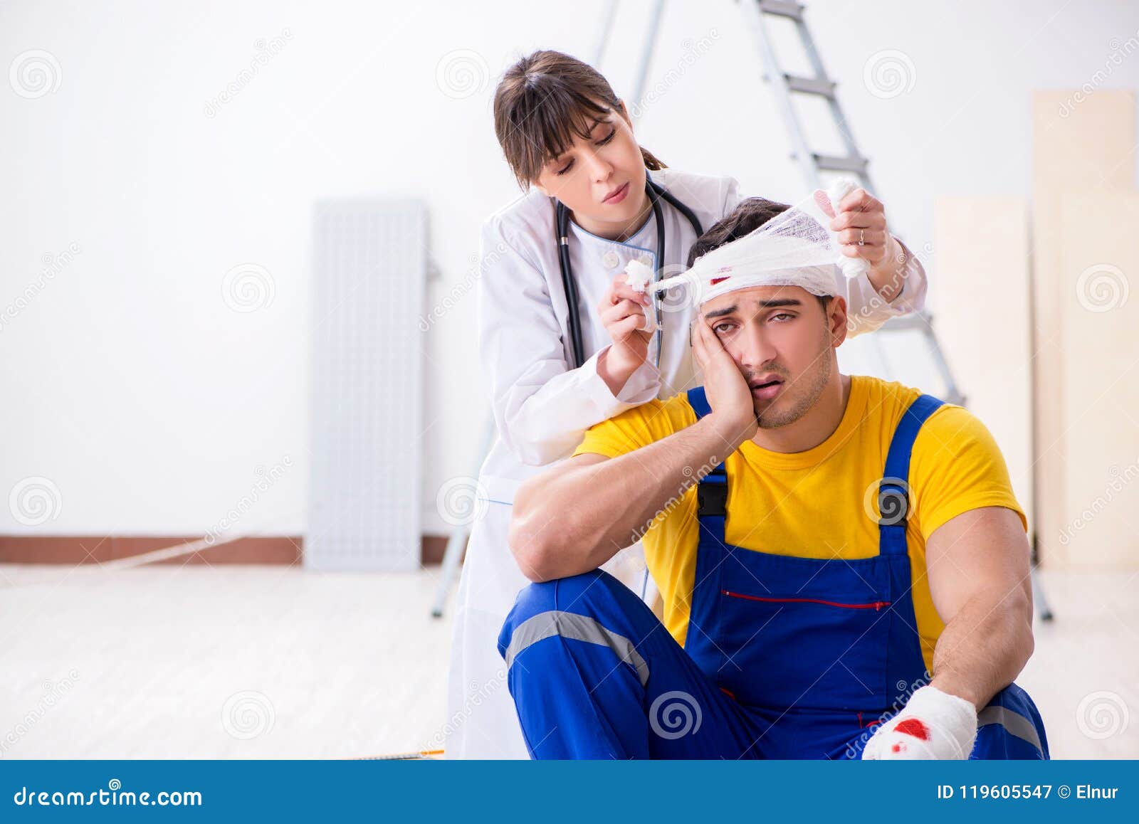 The Worker with Injured Head and Doctor Stock Image - Image of ...