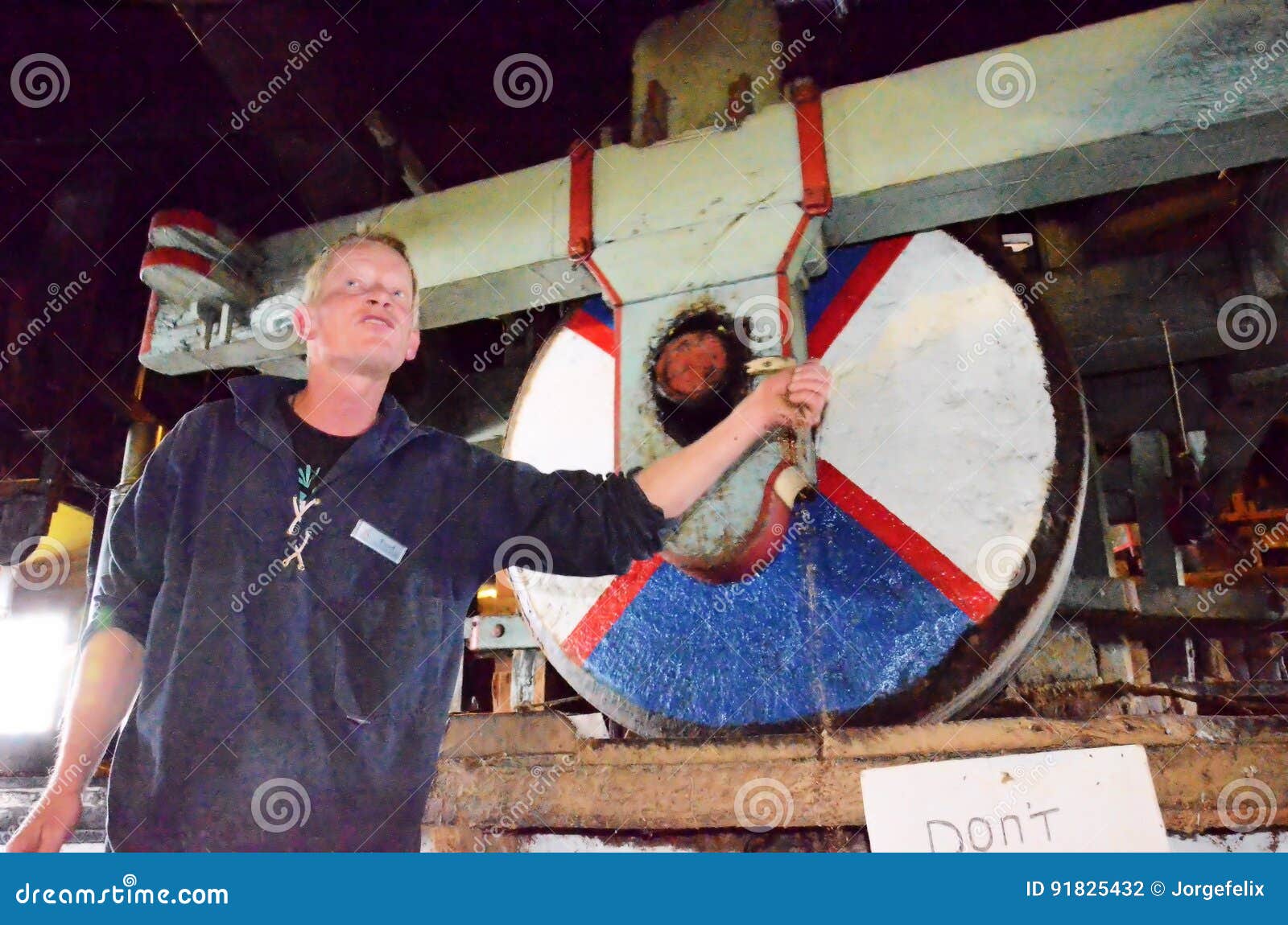 Worker inside a windmill editorial photography. Image of wood - 91825432