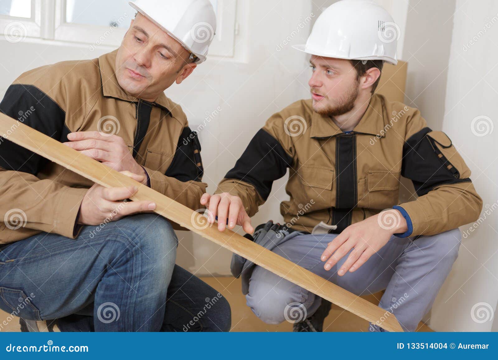 Worker Inspecting the Material Stock Photo - Image of contractor, home ...