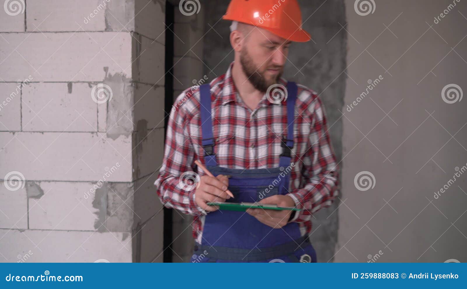 Worker Inspector or Engineer Checking and Inspecting a Building or ...