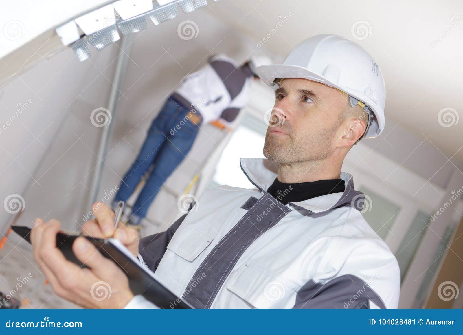 Worker Inspector Holding Clipboard on Background Construction Stock ...