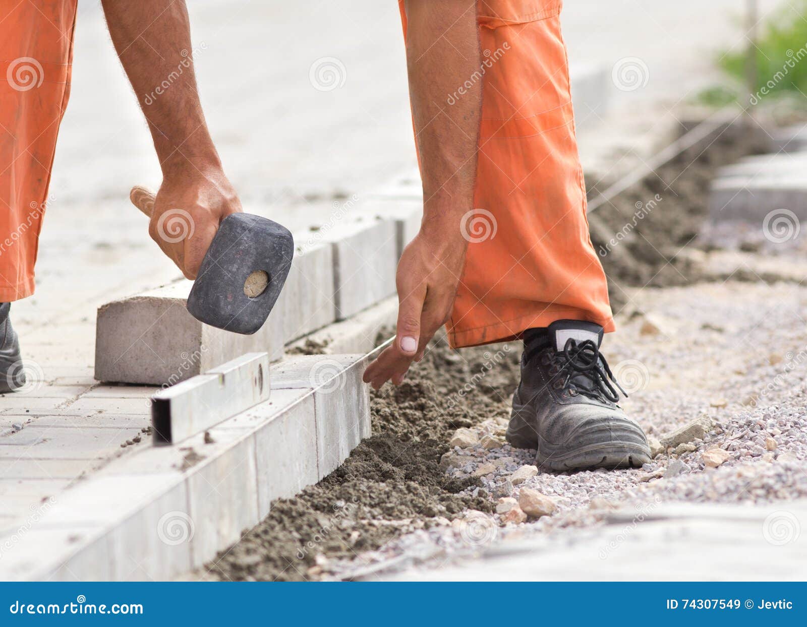 Worker Instaling Roadside Blocks Stock Image - Image of equipment ...