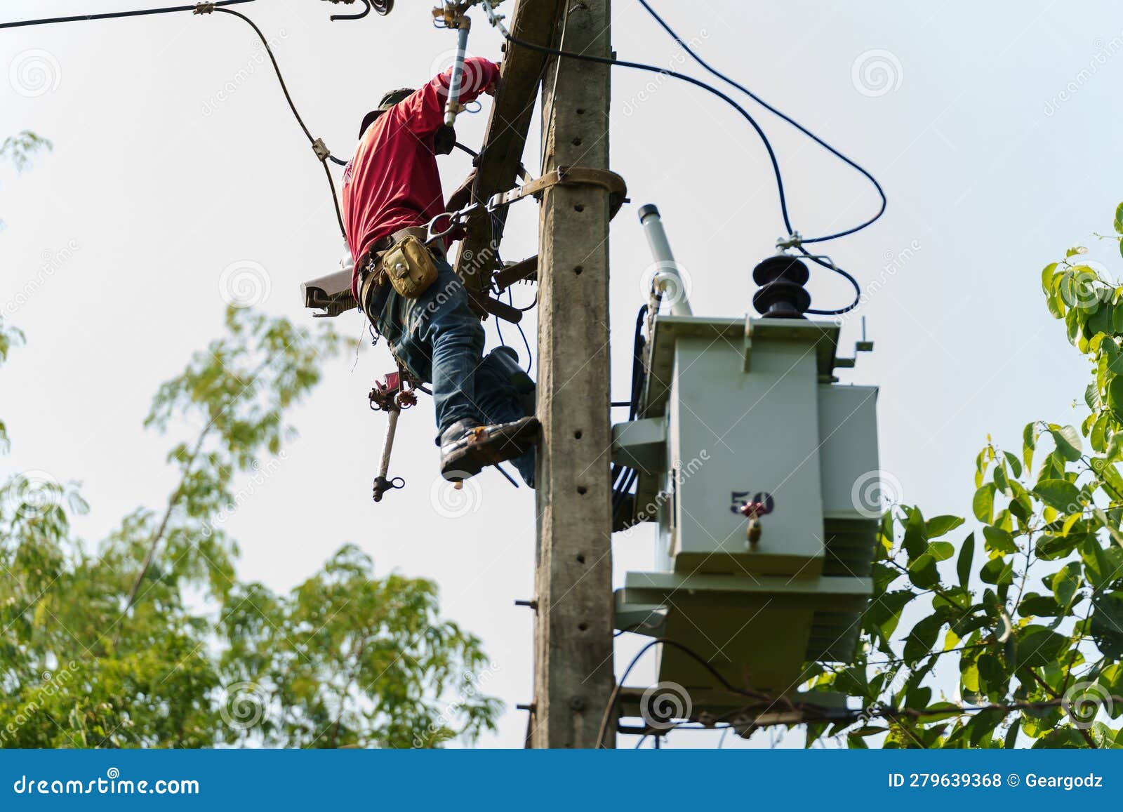 Worker Install a Three-phase Current Transformer on Electric Pole Stock ...