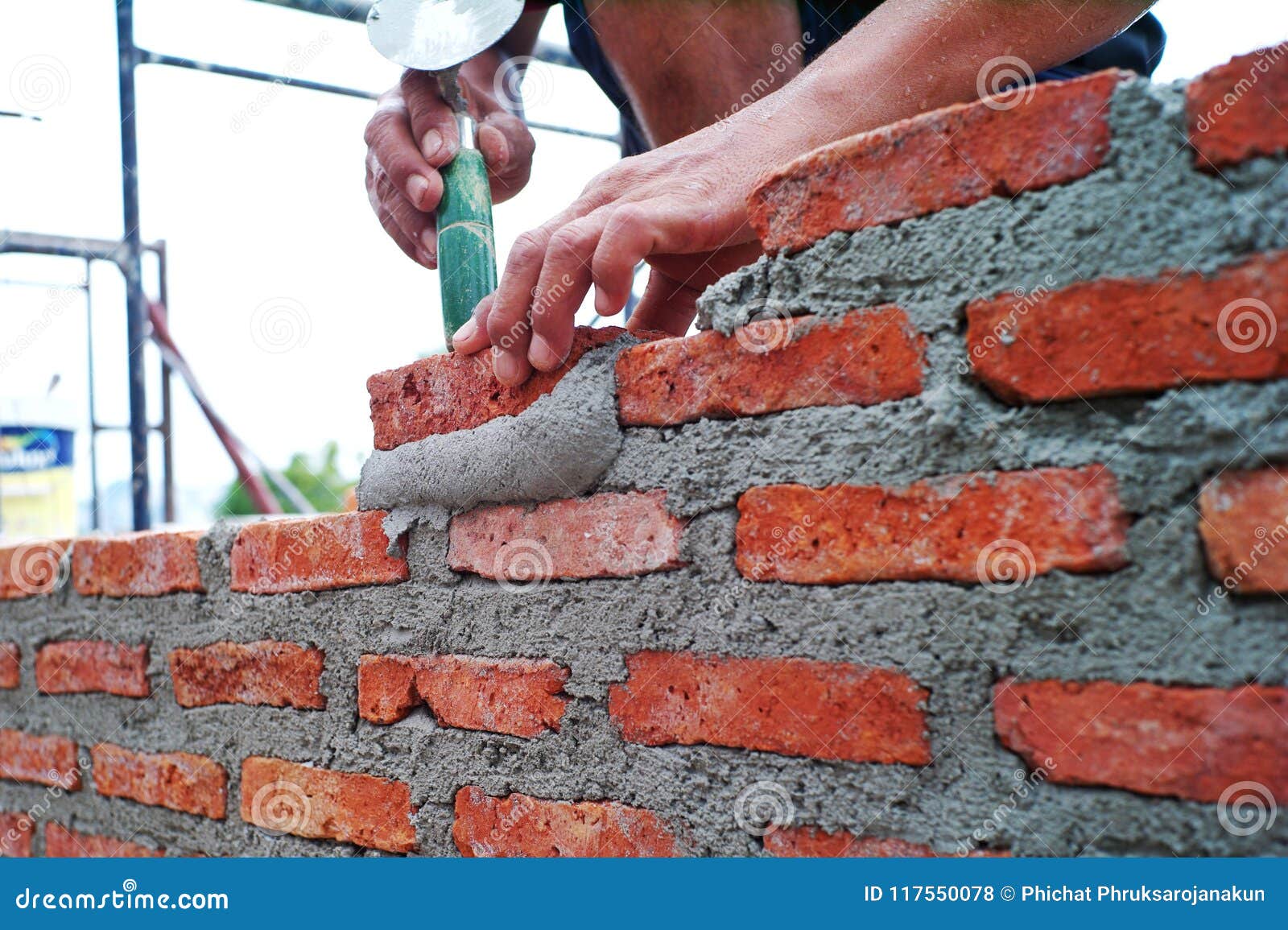 Worker is Installing the Bricklayer of the Wall Stock Photo - Image of ...
