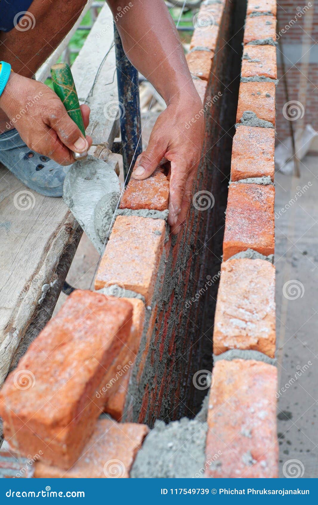 Worker is Installing the Bricklayer of the Wall Stock Image - Image of ...