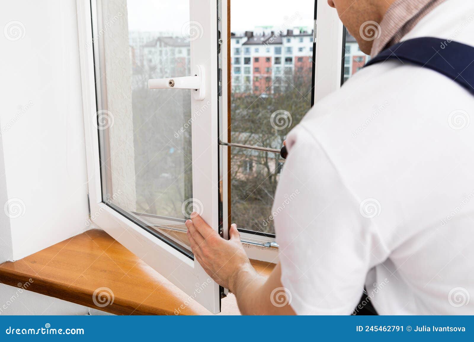 The Worker Installing and Checking Window in the House Stock Image ...