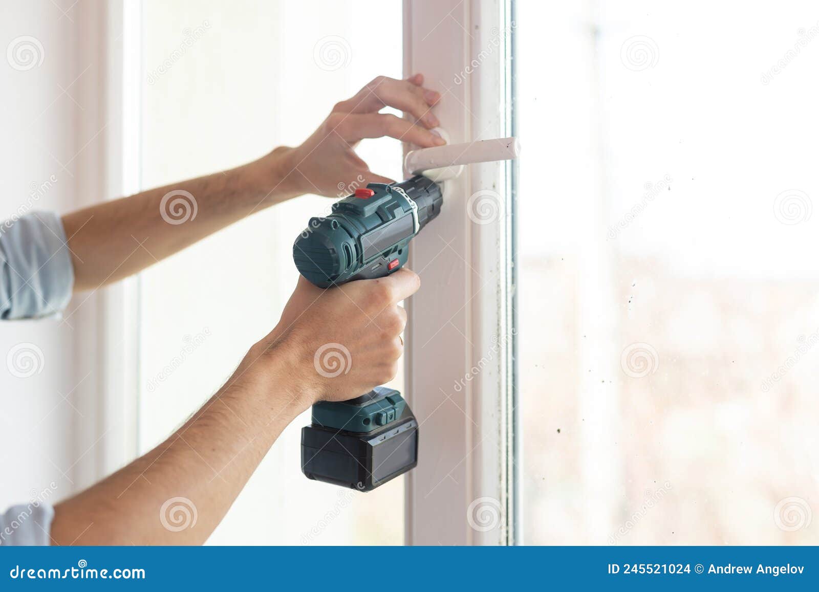 The Worker Installing and Checking Window in the House Stock Photo ...
