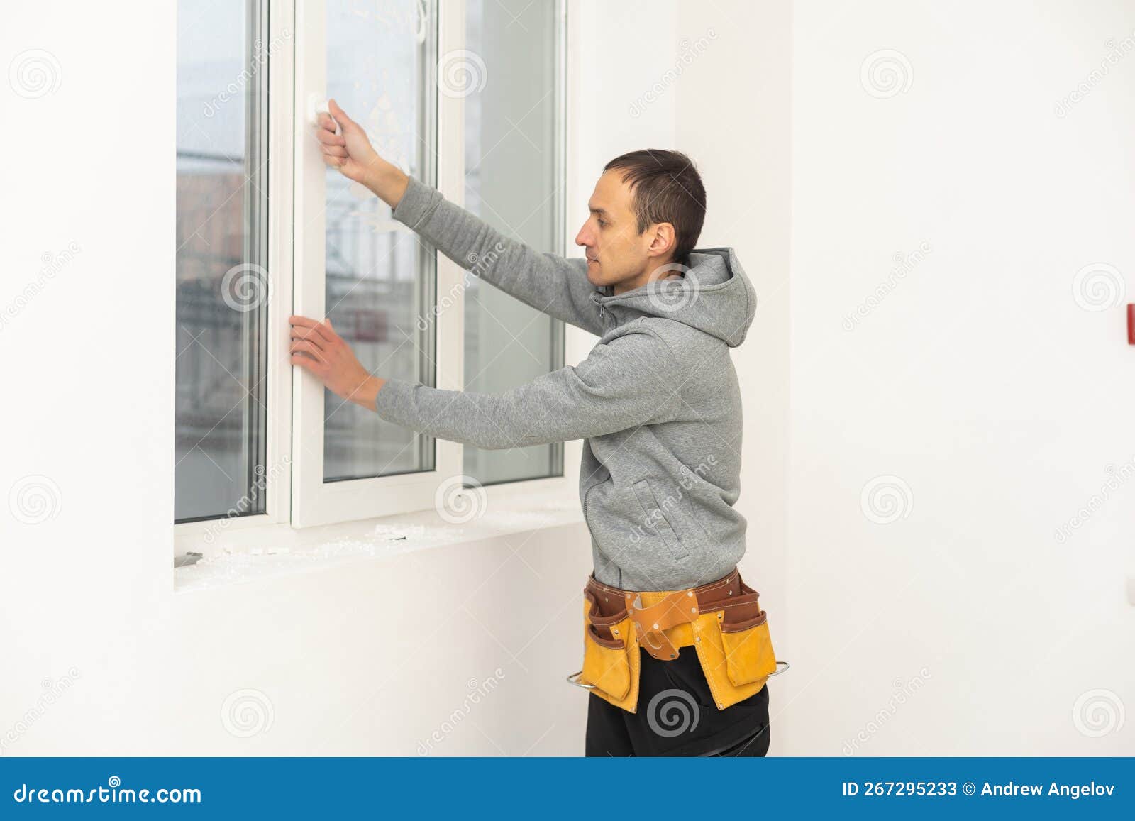 The Worker Installing and Checking Window in the House Stock Image ...