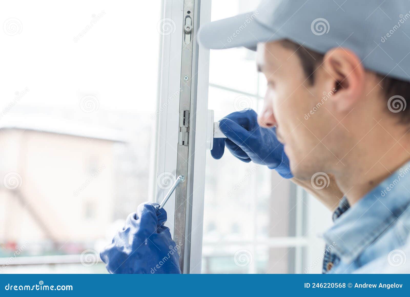The Worker Installing and Checking Window in the House Stock Photo ...