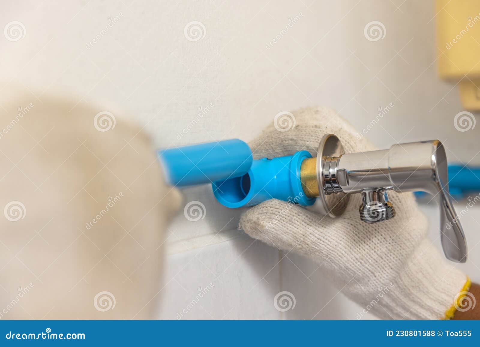 Worker Installing Floating Pipeline on the Wall in the Old Bathroom ...