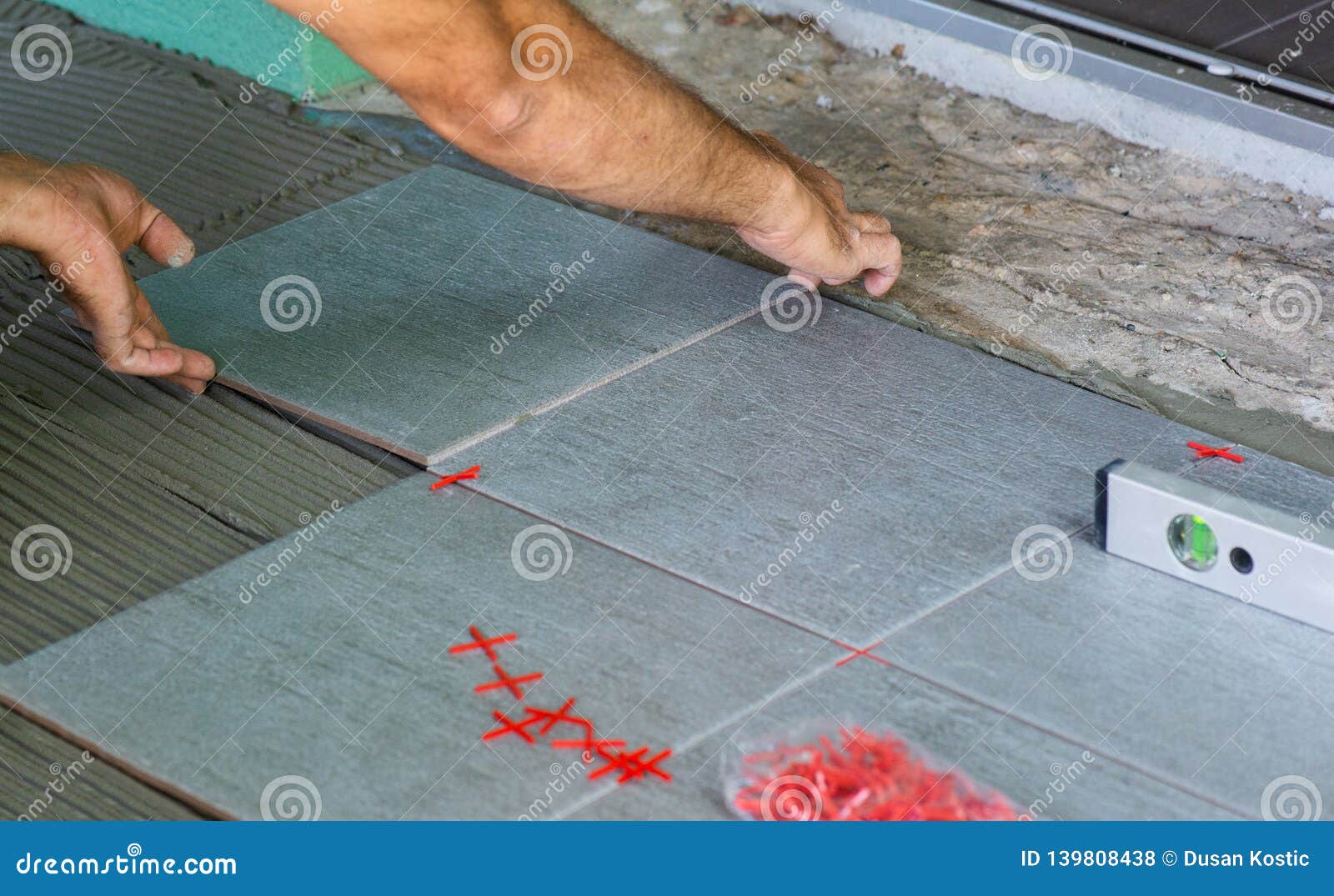 Worker Installing Floor Tiles Stock Photo - Image of improvement ...