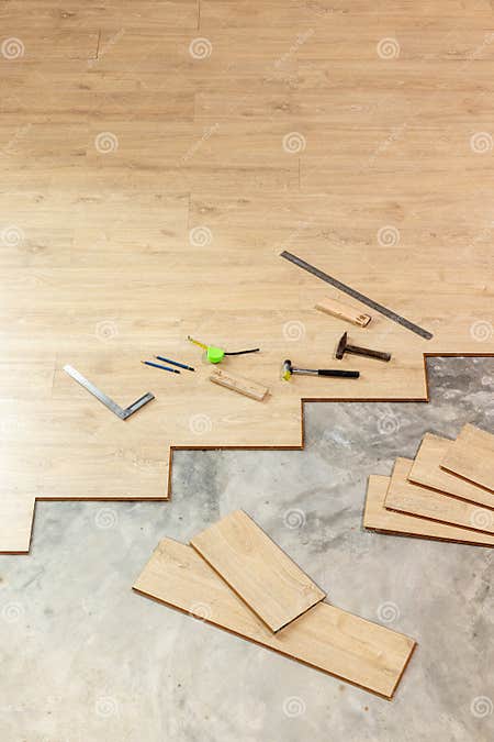 Worker Installing Interlocking Laminate Floor, Home Renovation Stock ...