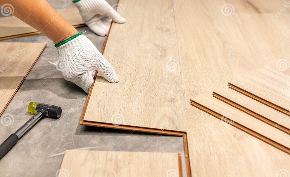 Worker Installing Interlocking Laminate Floor, Home Renovation Stock ...