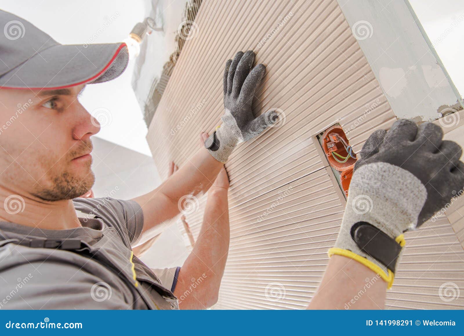 Worker Installing Large Tile Stock Image - Image of construction ...