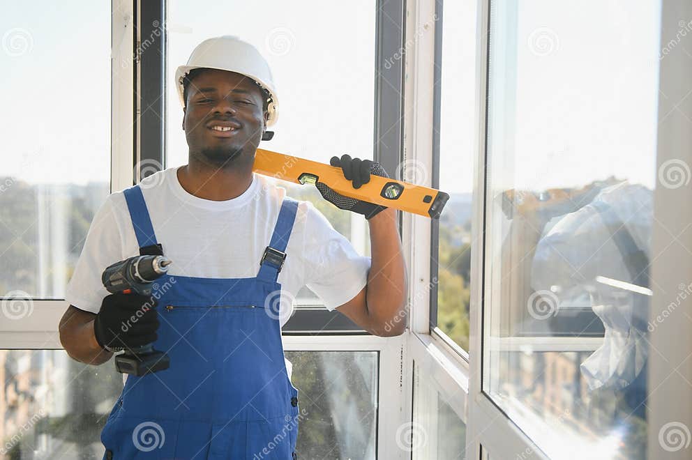 Worker Installing Plastic Window Indoors Stock Photo - Image of ...
