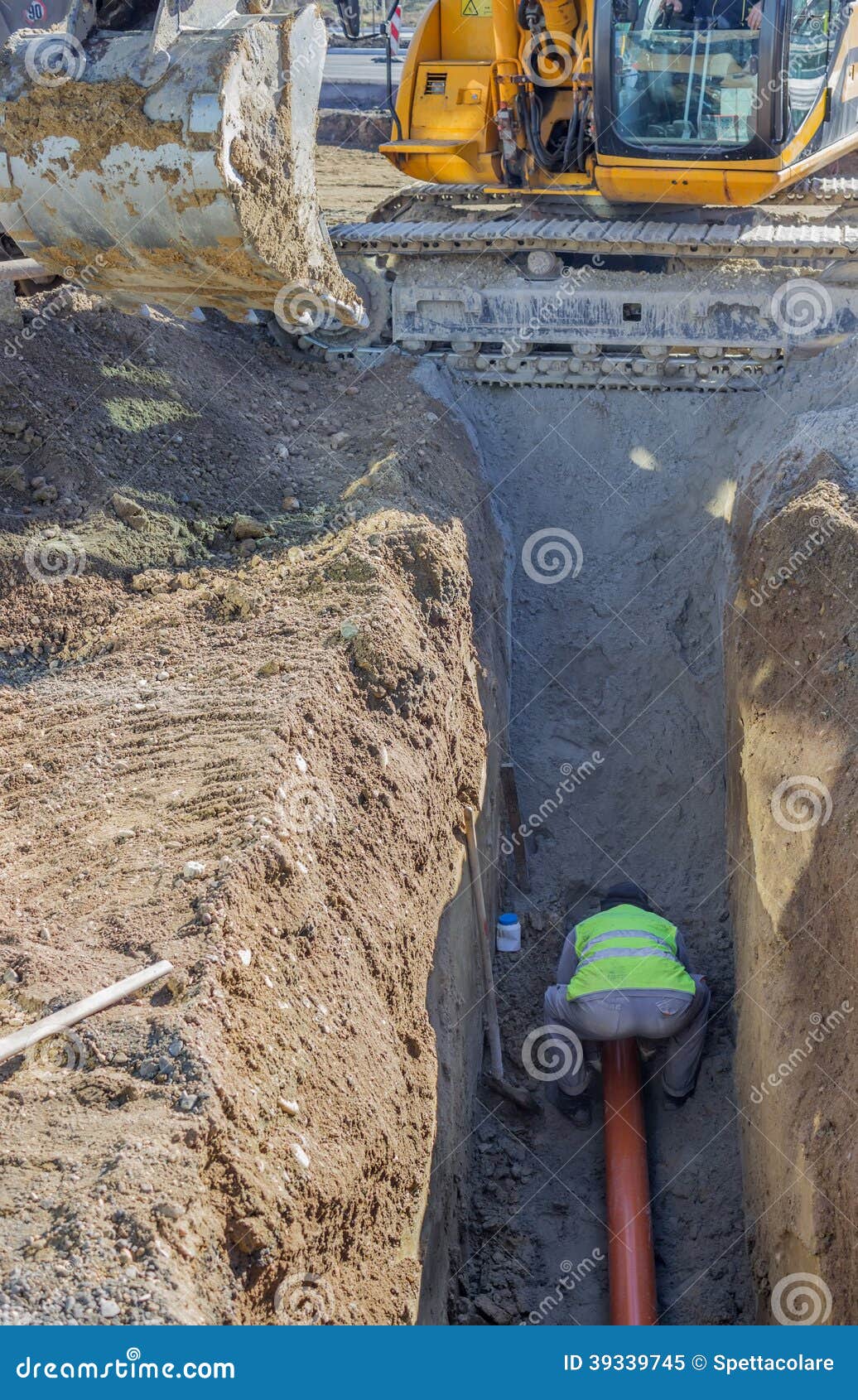 Worker Installing Sewer Pipe in Trench 2 Stock Image - Image of cross ...