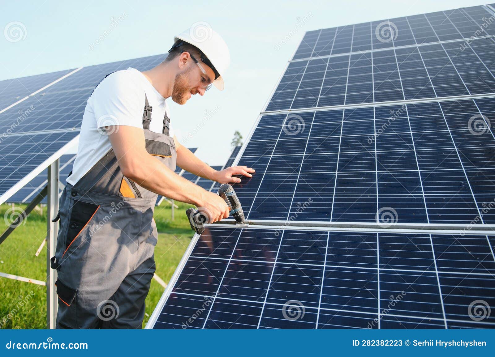 Worker Installing Solar Panels Outdoors Stock Image - Image of ...
