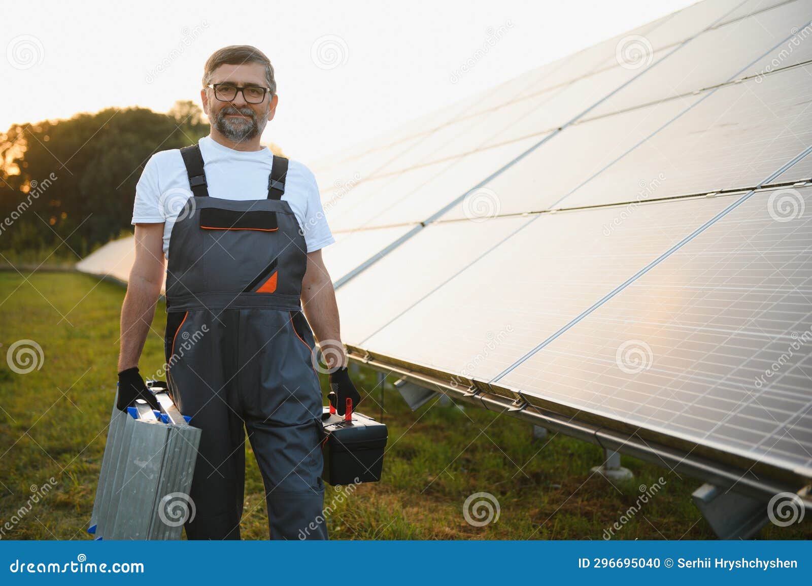 Worker Installing Solar Panels Outdoors Stock Photo - Image of ...