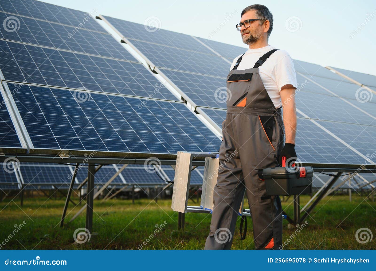 Worker Installing Solar Panels Outdoors Stock Photo - Image of ...