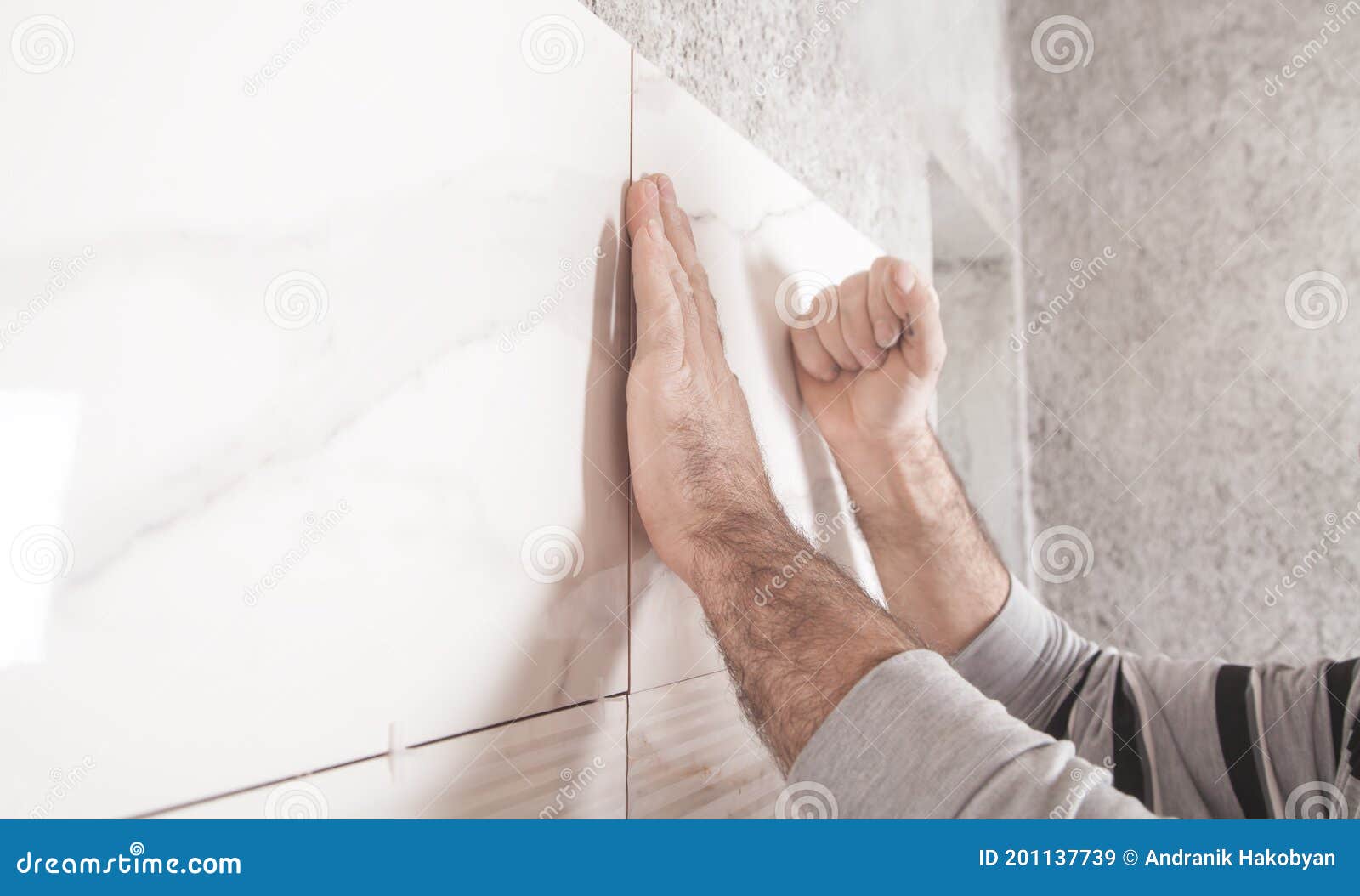 Worker Installing Tile on the Wall Stock Image - Image of wall, tile ...