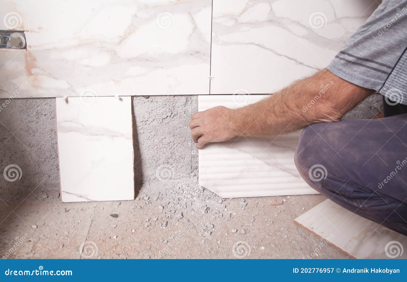 Worker Installing Tile on the Wall Stock Image - Image of building ...