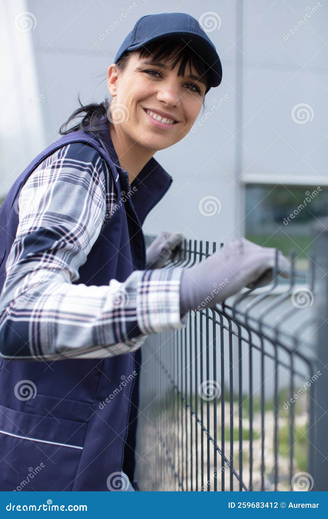 Worker Installing Welded Metal Mesh Fence Stock Photo - Image of welded ...
