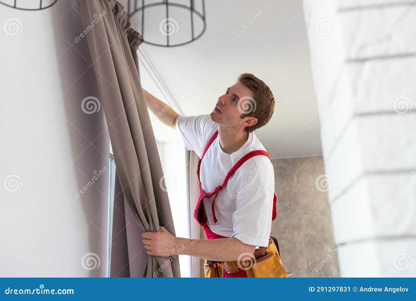 Worker Installing Window Curtain Rod on the Wall Stock Image - Image of ...